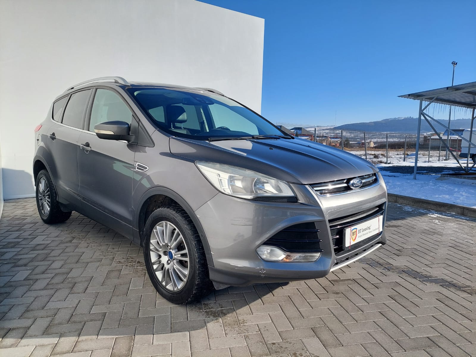Cu cât vinde Banca Transilvania un Ford Kuga diesel din 2013 cu aproape ...